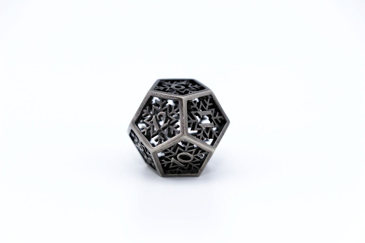 Silver Snowflake Hollow Metal d12 – Bookwyrm Games